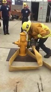 Laying a line for hose lay #5, above ground hose line at Drill Tower 40. Photo by A/O Andrew Lambert, DT 40 Instructor. | JoinLAFD