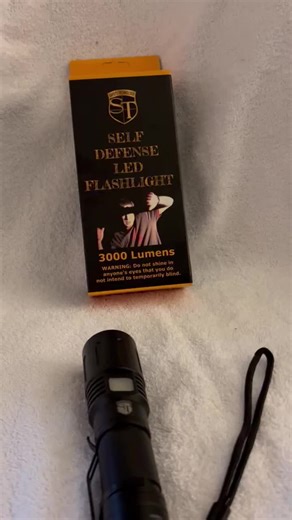 Over 1,300 feet! It has a blinding strobe setting for defense-disorientation and an SOS setting! https://ebay.us/m/UUVZL6