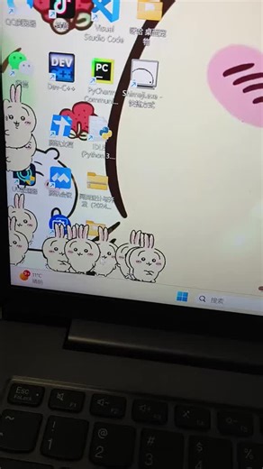 Cute Animated Bunnies on Laptop Screen