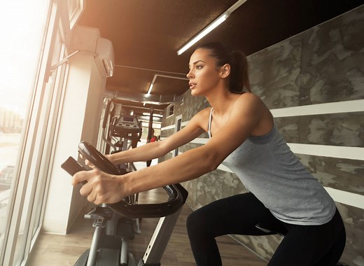 Here’s How Fast You Need To Ride a Stationary Bike for Weight Loss