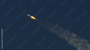 Space Rocket flies through blue skies and clouds after it leaves the launch pad on its way to space. 4K. Slow-motion. Includes sound and audio.