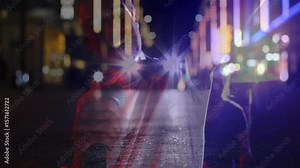 Performer entering neon scene lifting mic and starting singing with partner joining for music show