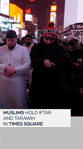 Hundreds of Muslims gathered in Times Square to break their fast and perform Tarawih prayers in the heart of New York City. The annual event, organised by Wayoflifesq, distributed roughly 1,500 meals and 1,200 Qurans in various languages. The gathering drew attention from tourists and locals, with many stopping to film the moment. Two people converted to Islam during the event. The first Times Square iftar was held in 2022. | TRT World