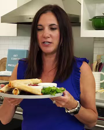 Whether you have leftover, canned, or rotisseried chicken, we have just the meal for you! These rolled tacos are the easiest way to get dinner on the table without having to break the bank or sacrifice anyone's preferences. Pop them in a pan or air fryer, and you are rockin' and rollin' for the rest of the night! 😋🌮 GET THE RECIPE: https://bit.ly/3YjxiNb | Allrecipes