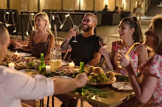 Dining at a Communal Table? Try These 6 Tips to Make Friends with Your Neighbors