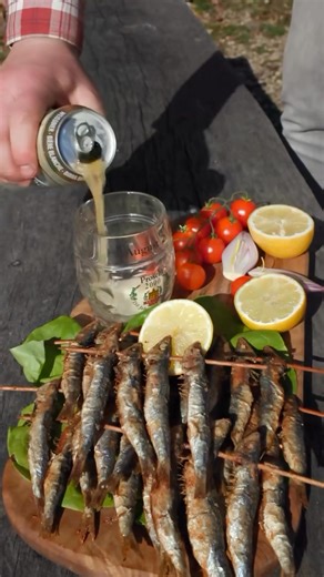 🔥 Juicy and crispy sardines on skewers — the ultimate beer snack cooked over fire! #food #beer #fish #grill #asmr #recipe #snack #outdoorcooking | SNAPSHORTS TV