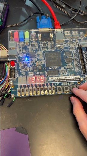 Reaction timer using 2 Hz LFSR, BDC counters and Finite state machine.
