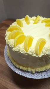 Lemon layer cake has two layers of moist lemon cake topped with a lemon frosting. One of our favorites (recipe in comments) | A Farmgirl's Kitchen