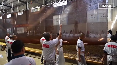 Making giant sheets of paper by hand: Inside the factory