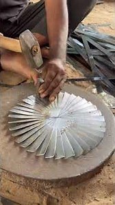 Poor man, using his brain faster than a computer, created a wonderful art with his hands.item