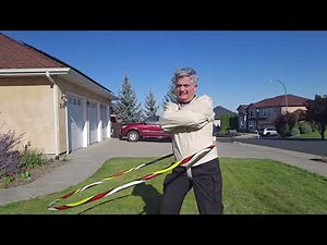 Straitjacket Escape While Hula Hooping