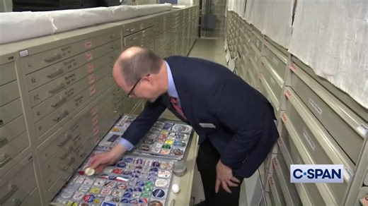 From the basement of Iowa's historical museum, here's a look into the expansive collection of political signage that has influenced caucus-goers since 1972. | C-SPAN