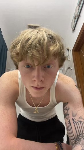 Tattoo Showcase: Unique Designs in a Bathroom Setting