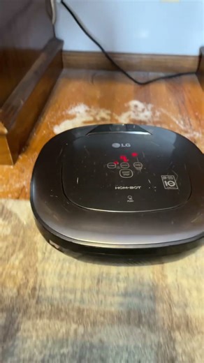 LG Hom-bot VR65710LVMP eating white stuff