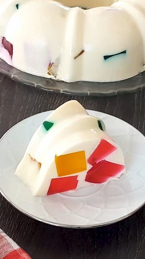 Cathedral Window Gelatin is a show-stopping dessert masterpiece perfect for the holidays. Soft, creamy, and silky with colorful gelatin, it tastes amazing as it looks! Btw, this is one of our oldies but goodies. I published the recipe on my website back in 2017, and Andrea filmed this video in 2019. Definitely a classic😊 #filipinofood #dessert | Kawaling Pinoy Recipe Blog