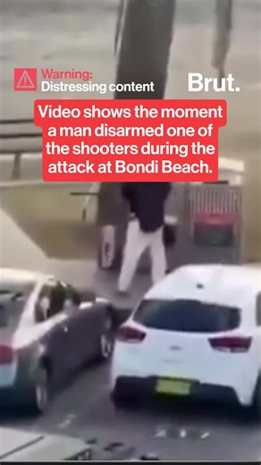 Video shows the moment a bystander disarmed one of the shooters during the December 14 attack at Bondi Beach in Sydney, Australia. Authorities have stated that there were two shooters in the attack, which they have determined was