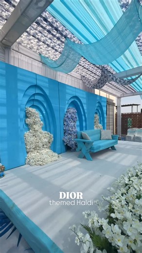 Bibudh & Munali on Instagram: "A sunlit carnival affair painted in shades of ivory and blue 💙✨ Wedding Social Media: @theweddingbulletin Event Management: @tj_magical_moments Decor by: @madlani_mandap_service #diorthemedhaldi #haldi #carnival #haldidecor #haldifunction [haldi, haldi carnival, Dior-themed haldi, haldi decor, haldi inspo, blue haldi, Dior blue, Tiffany blue, haldi inspiration, not your regular yellow haldi, wedding reels, wedding social media, wedding content creator in Gu