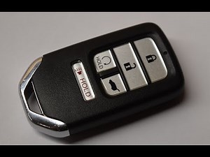 How to replace the battery of the Honda Pilot remote control?