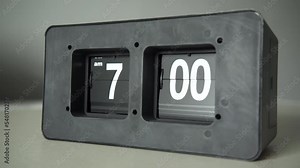 Flip clock shows it's 7 a.m. time