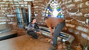 Installing the ducting for our off-grid heater | Our Self-Reliant Life