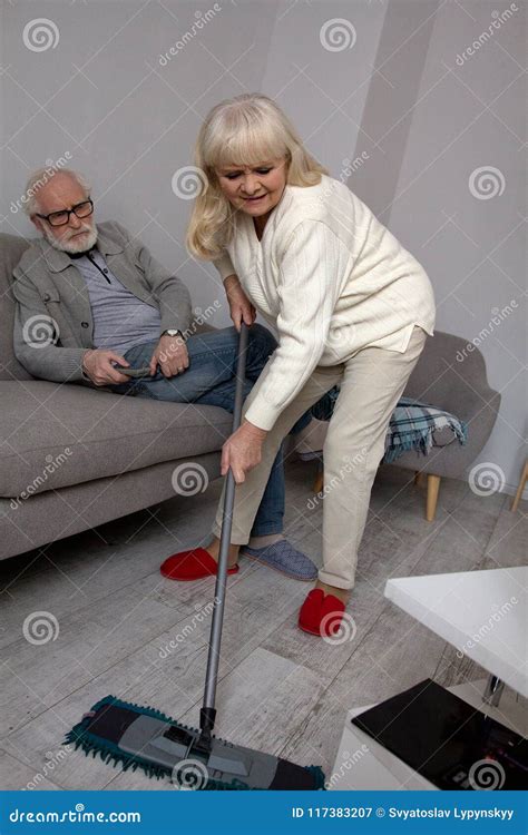 Old Lady Cleaning In Livingroom Stock Image Image Of Happy Couch 117383207