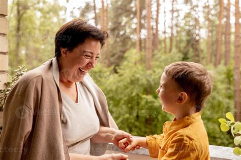 Happy Grandmother And Grandson Enjoy Time Together Positive Middle Age