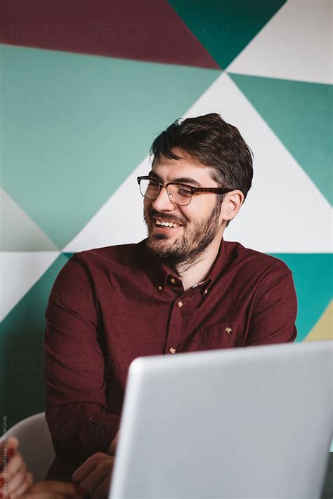 Handsome Man At The Office Del Colaborador De Stocksy Katarina