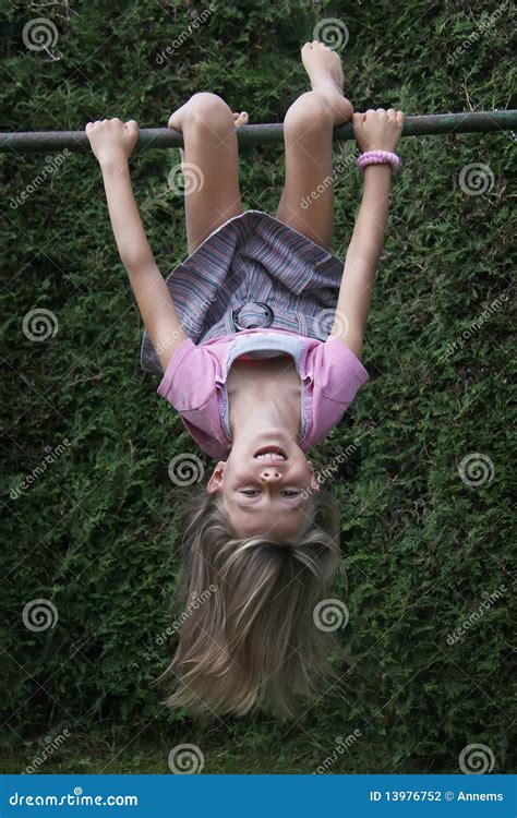 Girl Hanging Upside Down