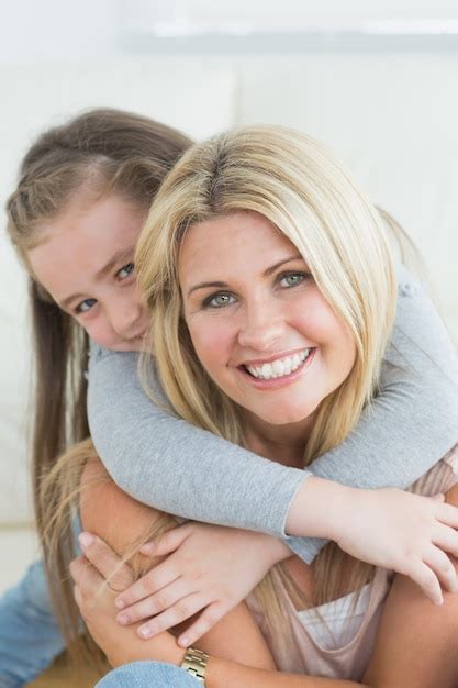 Premium Photo Daughter Hugging Her Mother From Behind