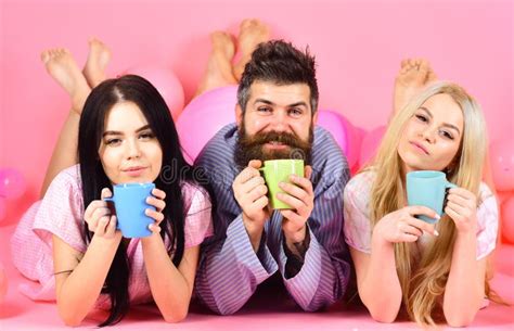 Threesome Relax In Morning With Coffee Lovers Concept Man And Women Friends On Sleepy Faces