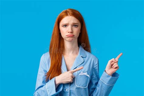 Regret Bad Mood And Advertising Concept Sad Unhappy Redhead Girl In Nightwear Sulking And