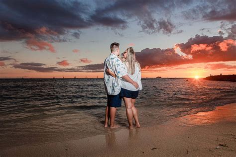 Download Couple Sunset On Sandy Beach Picture