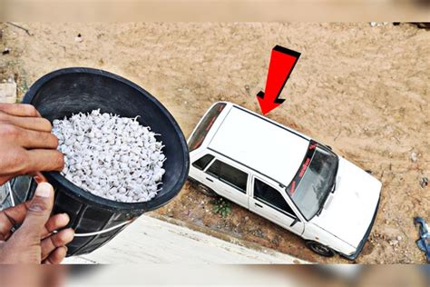 将10000枚摔炮从楼顶倒下能把汽车炸出洞吗场面太无趣了 汽车 摔炮 场面
