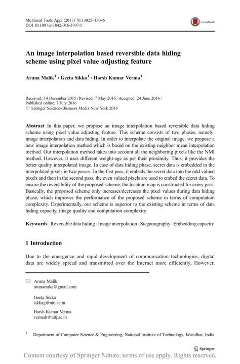 an image interpolation based reversible data hiding scheme using pixel value adjusting feature