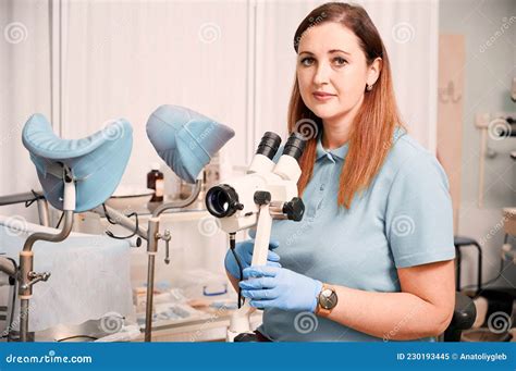 Beautiful Female Doctor Using Colposcope In Gynecology Office Stock Image Image Of Health