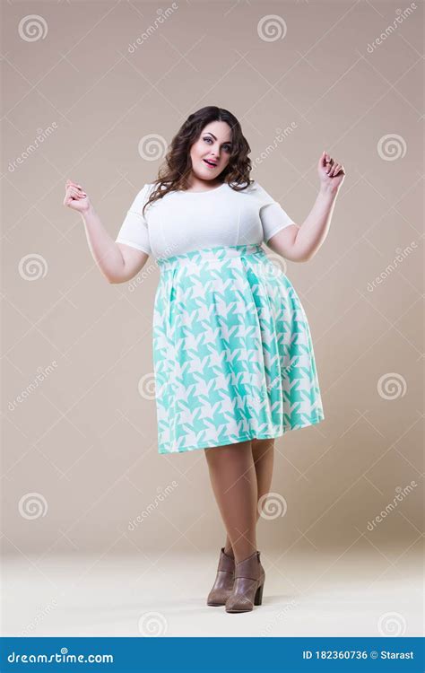 Happy Plus Size Fashion Model In Casual Clothes Fat Woman On Beige Background Body Positive