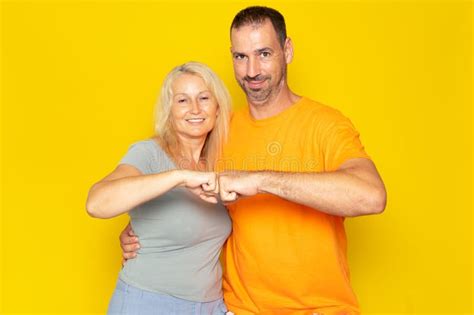 Partnership And Collaboration Work As A Team Caucasian Woman And Man Making Fist Bumps And