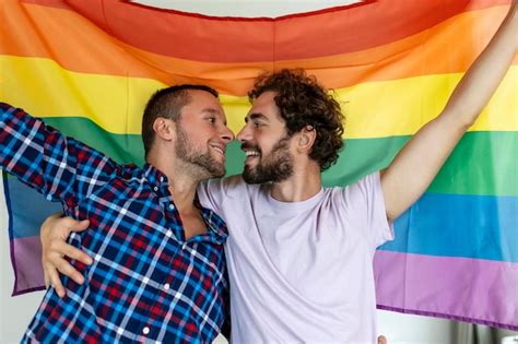 Premium Photo Two Young Gay Lovers Kissing Each Other Affectionately Two Young Male Lovers