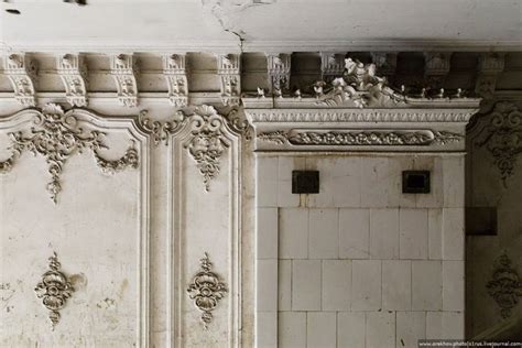 An Old Bathroom With Peeling Paint On The Walls