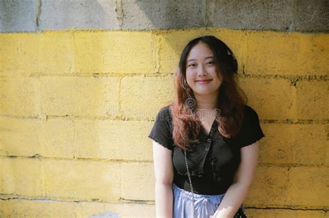 Portrait Of Chubby Asian Woman Standing Outdoor Against Japanese Building Style Stock Image