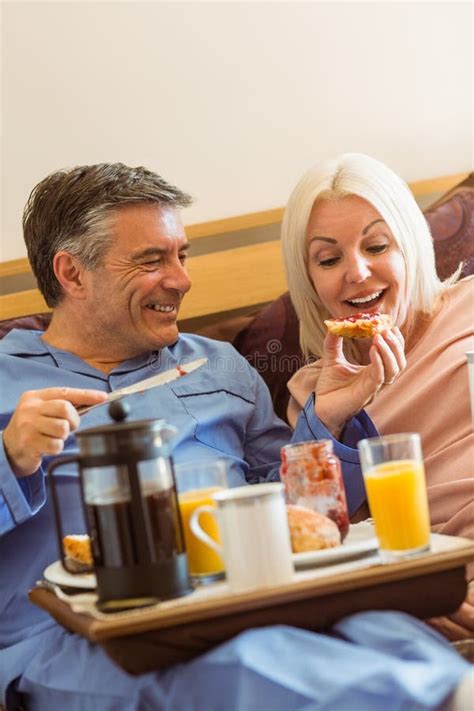 Happy Mature Couple Having Breakfast In Bed Stock Image Image Of Homey Glass 49902845