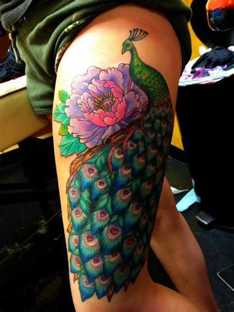 Peacock Thigh Piece This Is Exactly Howwhere I Want Mine Minus The Flowers Peacock Tattoo