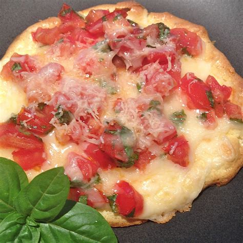 Low Carb Pizza Crust With Fresh Tomato Basil Sauce And Cheese Low Carbohydrate Recipes No Carb