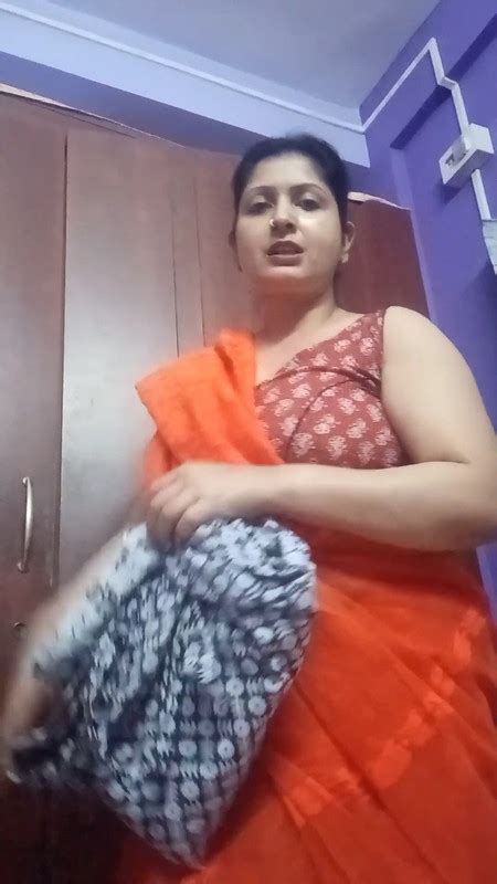 Chubby Bengali Aunty Sexy Open Big Deep Navel And Big Boobs In Orange Saree