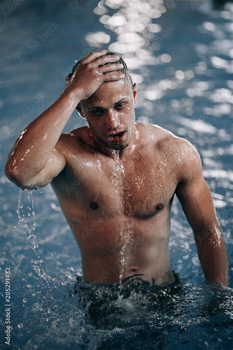 Sexy Male Model Posing In Swimming Pool Stock Photo Adobe Stock