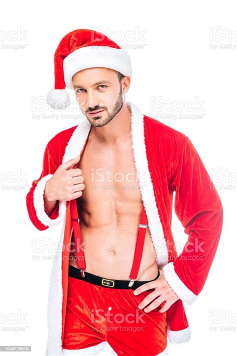 Handsome Muscular Man In Santa Claus Costume Showing Torso Isolated On White Background Stock