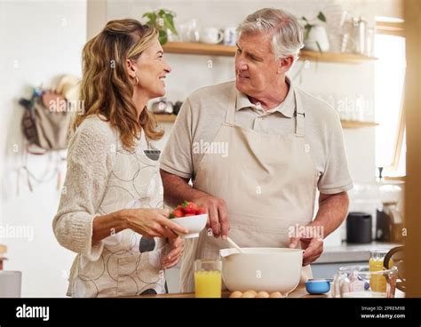 Elderly Couple And In Kitchen For Baking With Strawberry Egg And Happy Together In Home