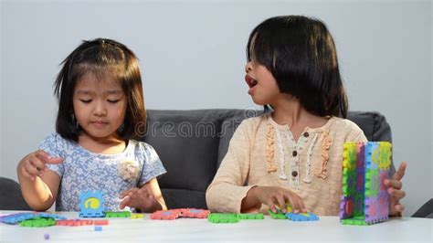 Asian Sister With Young Brother Playing Practise With Smile Face At Home Stock Video Video