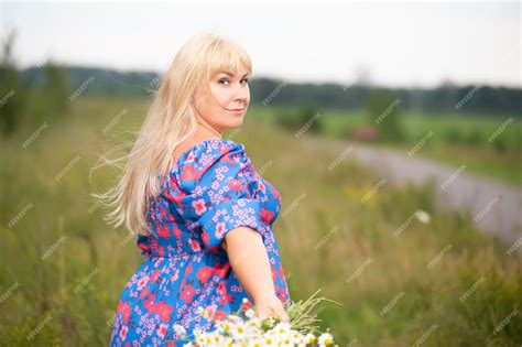 Premium Photo Beautiful Plus Size Woman With White Hair In A Summer Dress Posing Outdoors With