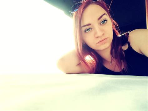 Premium Photo Beautiful Young Woman With Redhead Leaning On Table